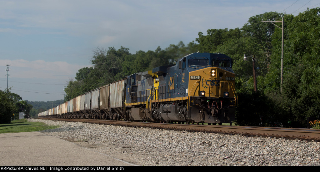 CSX 312 leads a unknown grain.